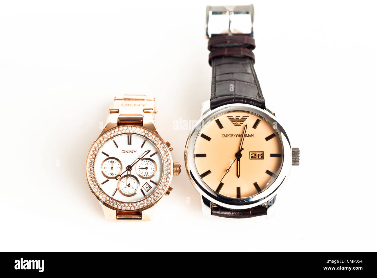 a couple of wrist watches together on white background Stock Photo - Alamy