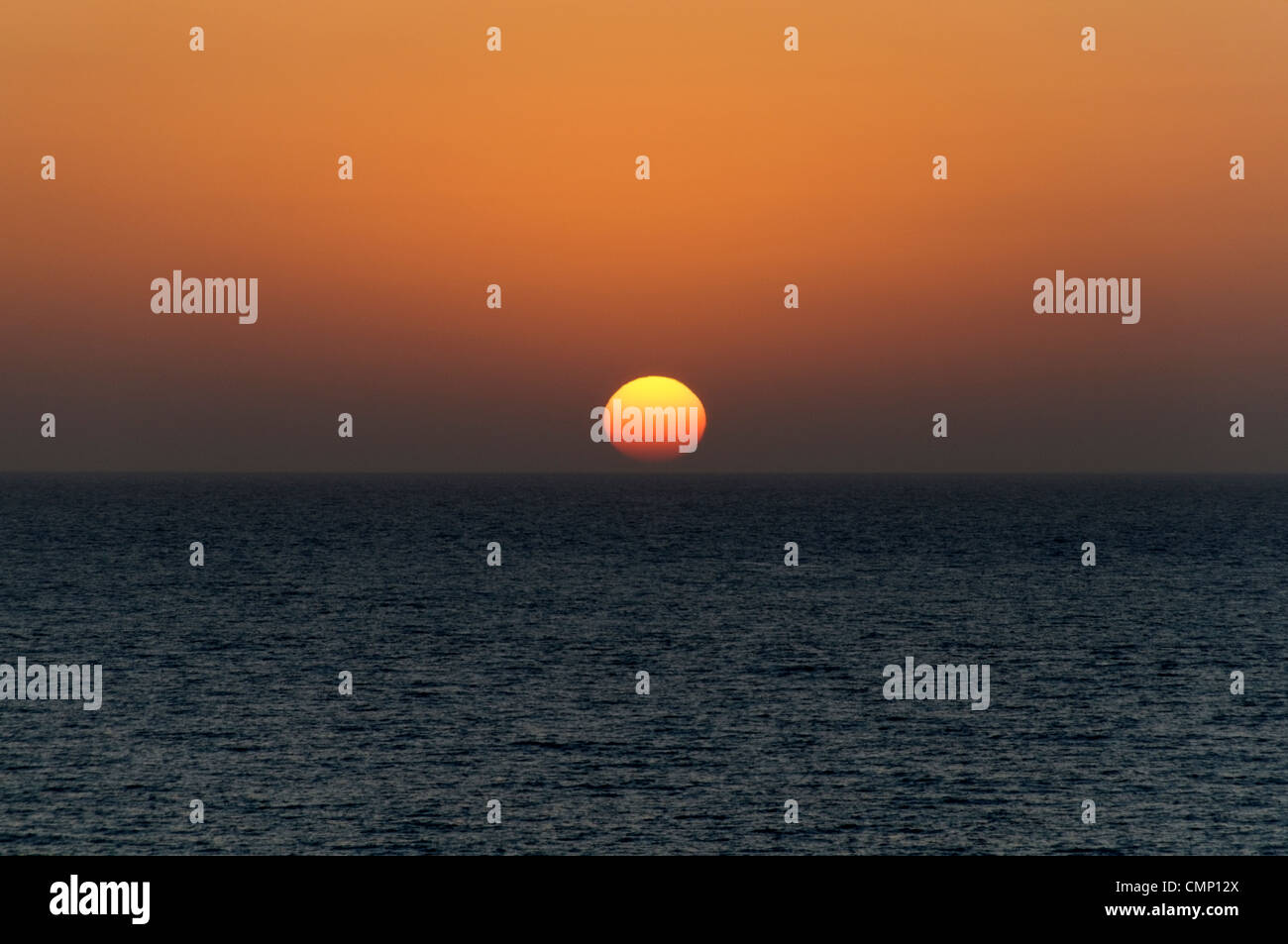 Apollonia. Libya. View of the sun setting over the Libyan ...