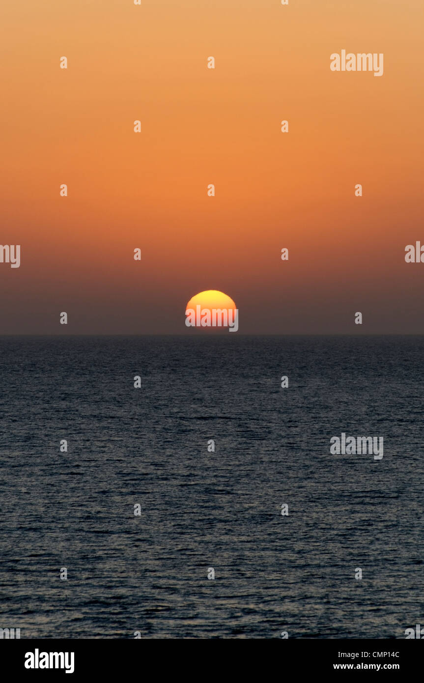 Apollonia. Libya. View of the sun setting over the Libyan ...