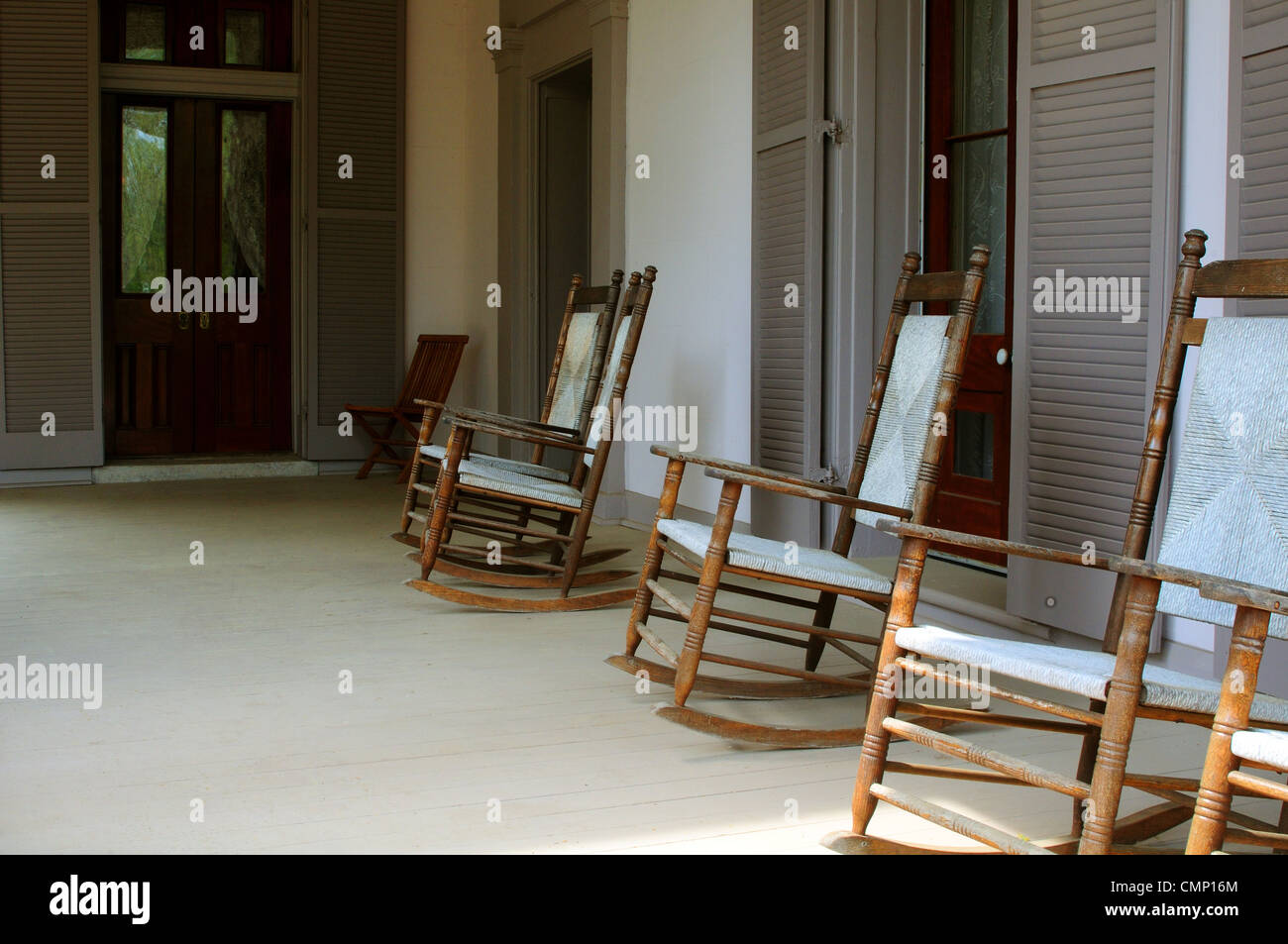 Rocking chairs on the porch of an antebellum southern plantation ...