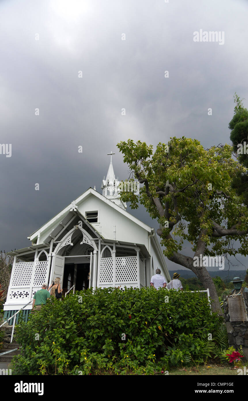 exterior painted church with 4 people on the Big Island, Hawaii Stock ...