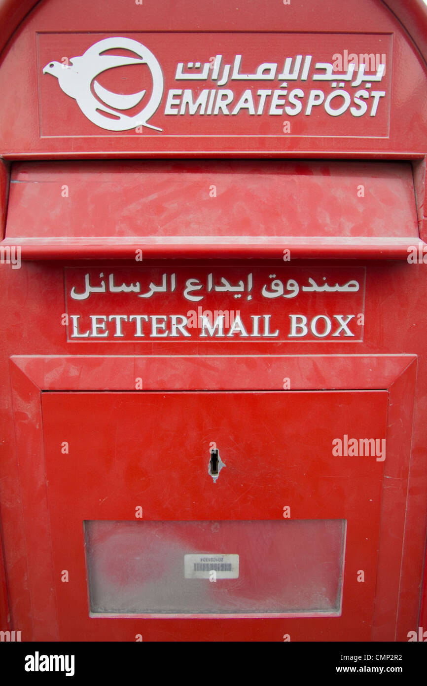 United Arab Emirates, Dubai – A vibrant red post box, symbolizing the ...