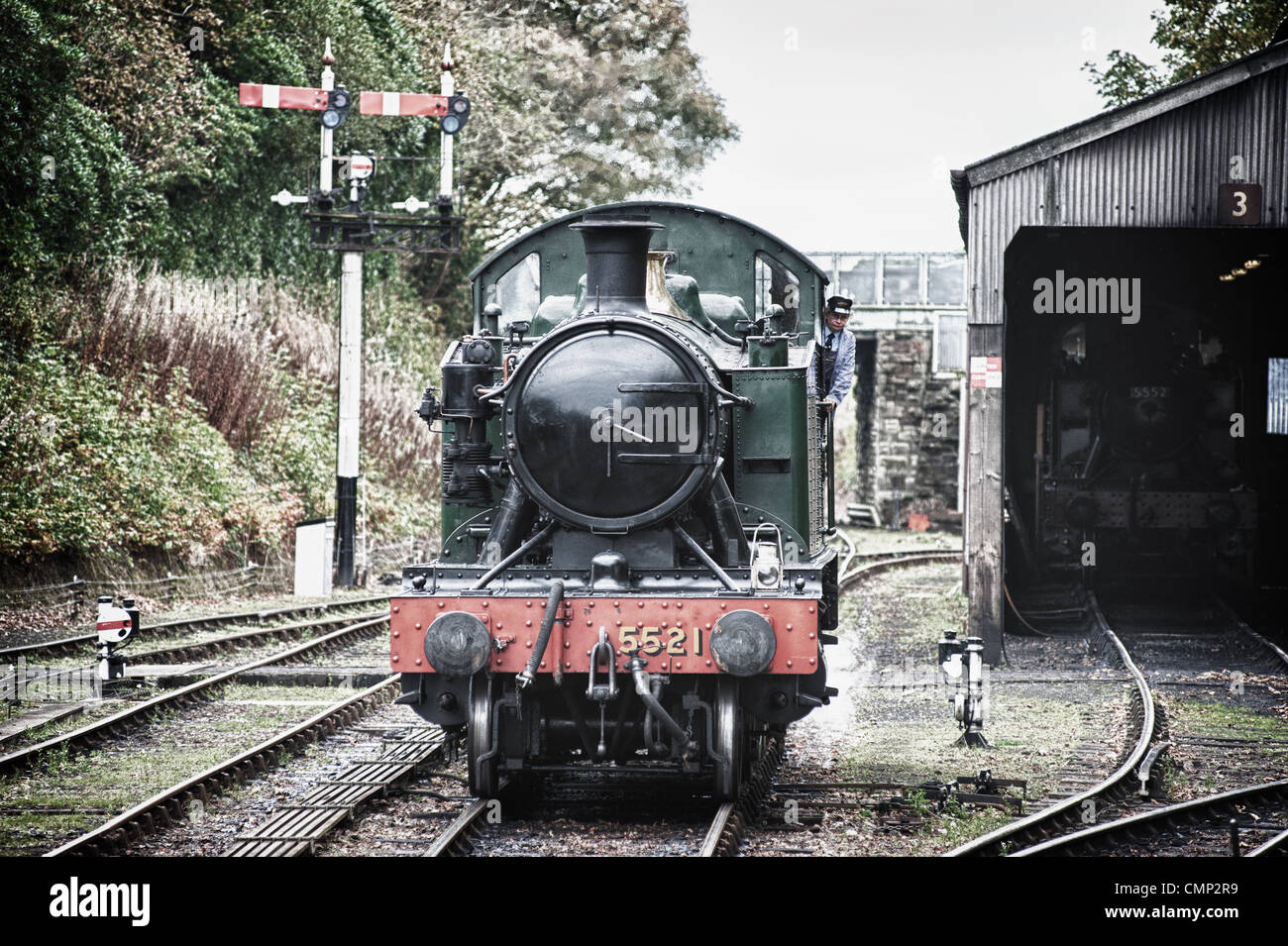 5521, a GWR 2-6-2 built in 1927, pulls into Wenford Railway Station ...