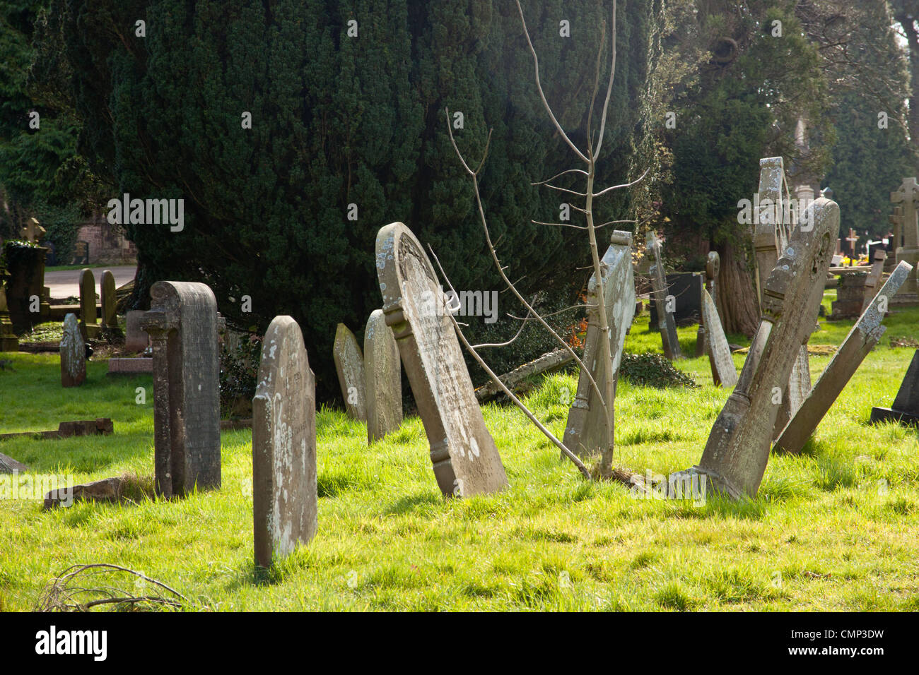 Leaning headstones in cemetery hi-res stock photography and images - Alamy