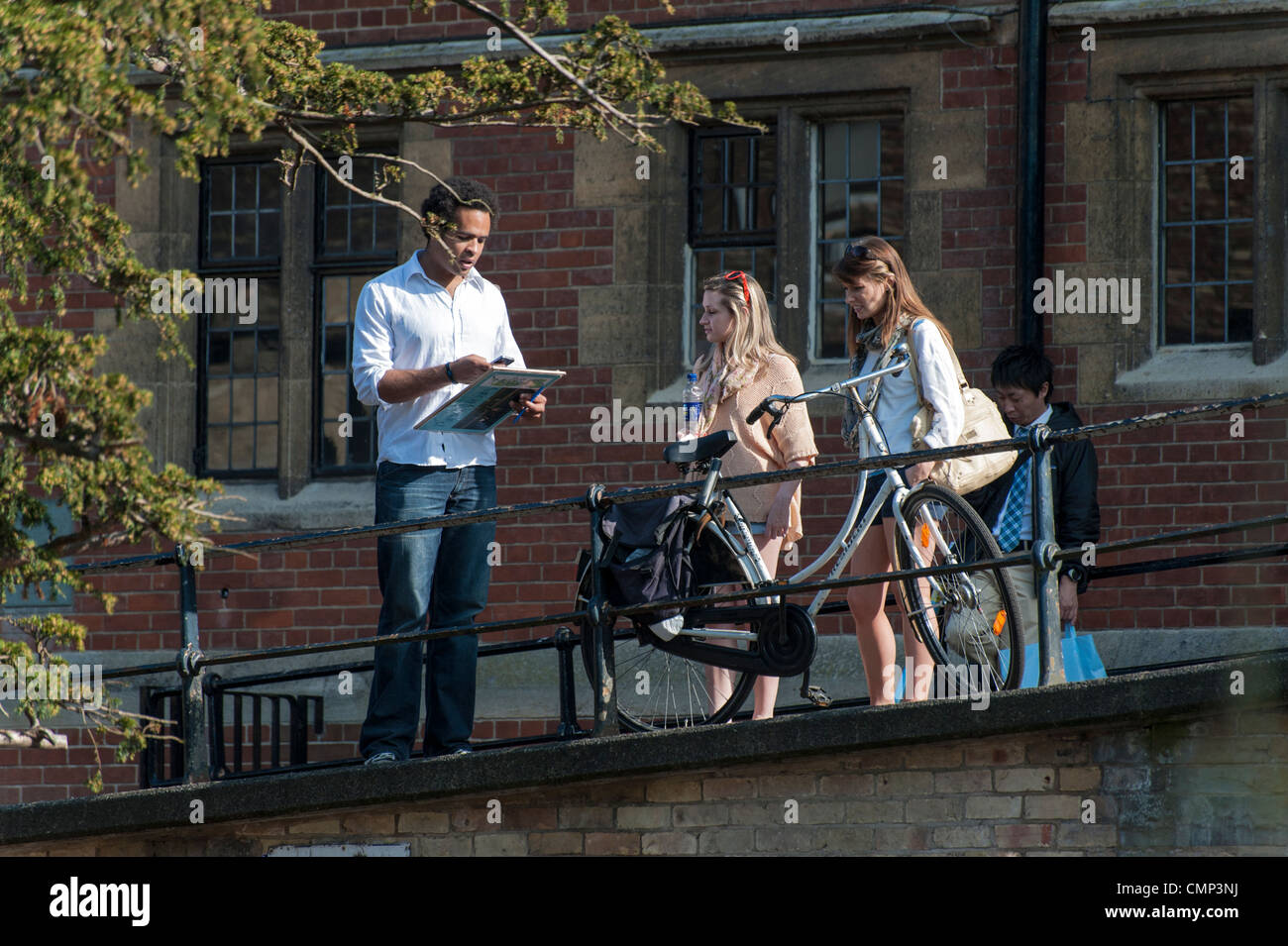 Punting in Cambridge UK in spring sunshine on the River Cam Stock Photo ...