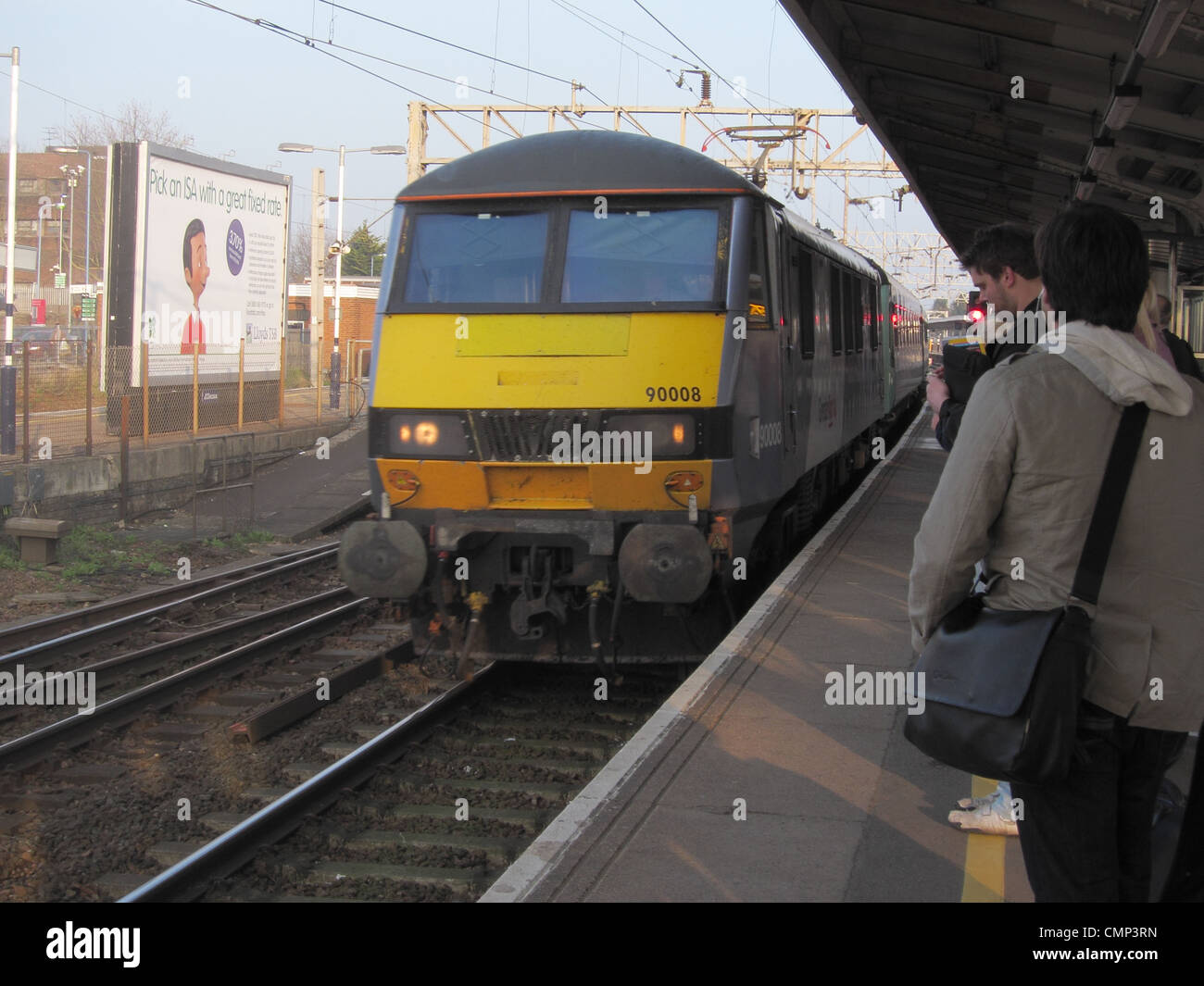 train pulling into station Stock Photo - Alamy