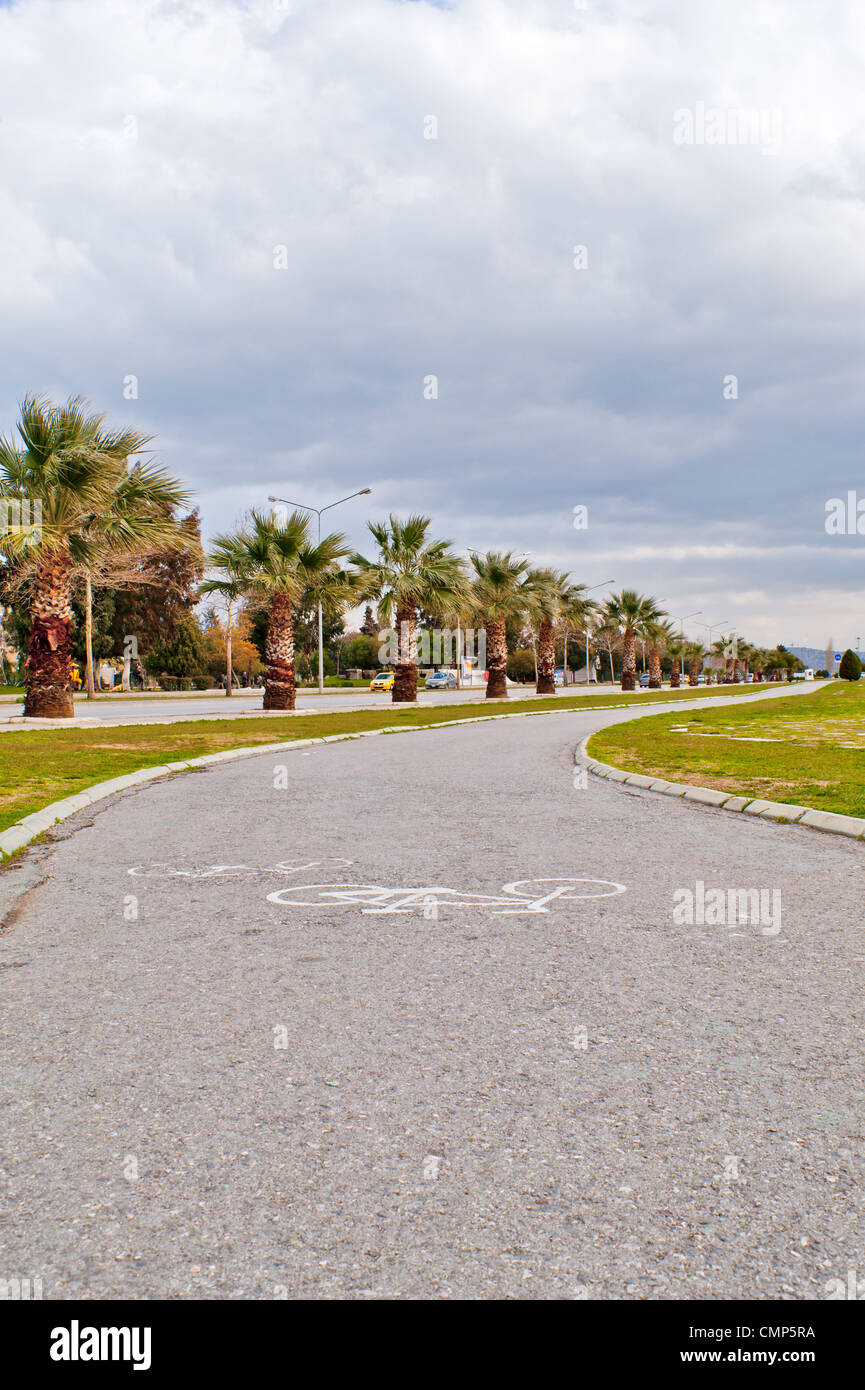 Green cycling way in center of the city Stock Photo - Alamy
