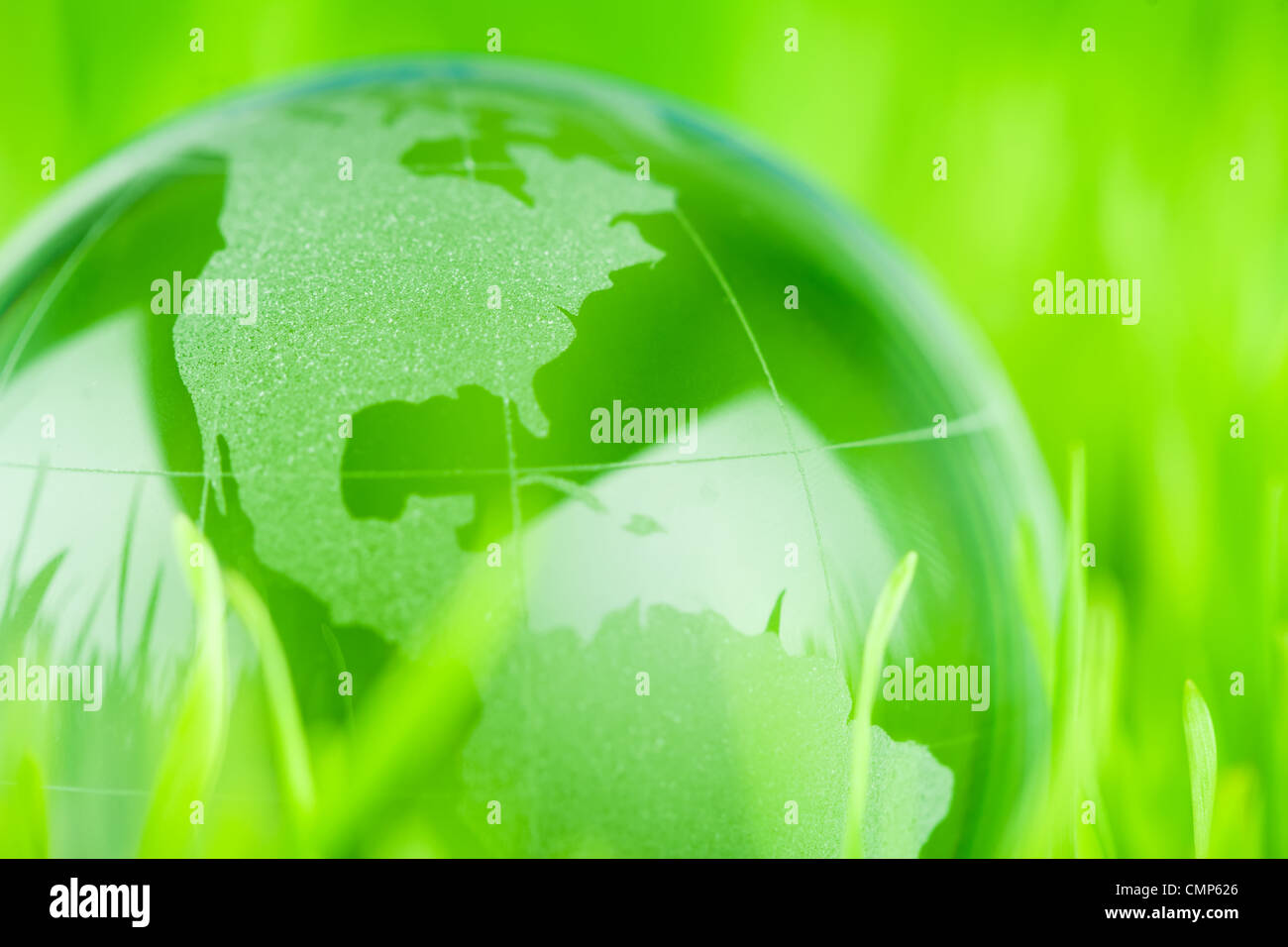 Glass earth in grass Stock Photo - Alamy