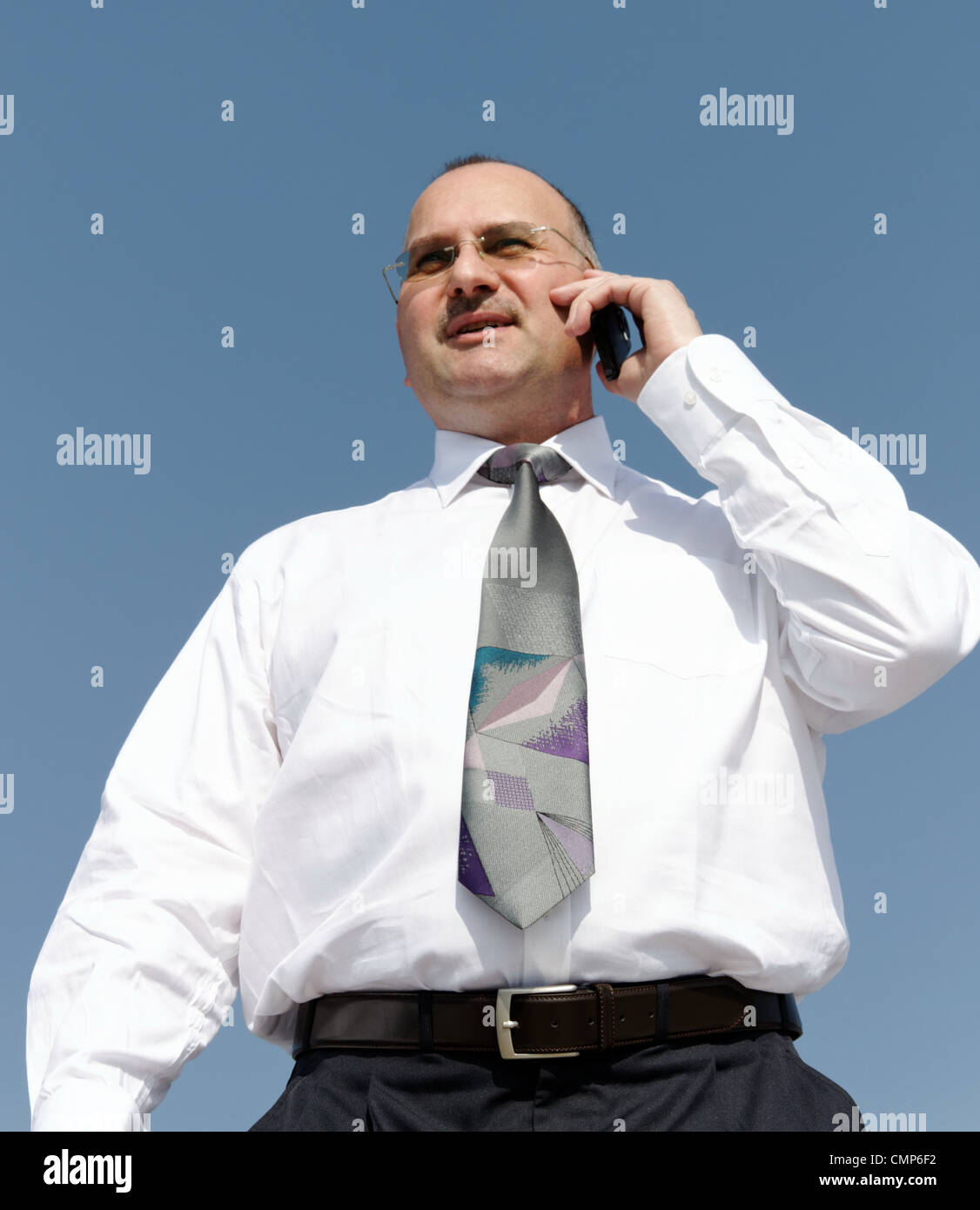 a businessman talking to the company Stock Photo - Alamy