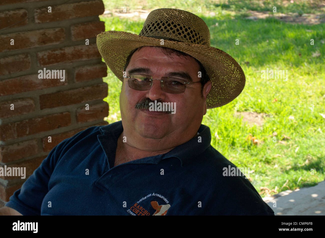 Mexican rancher relaxing on the ranch Stock Photo - Alamy