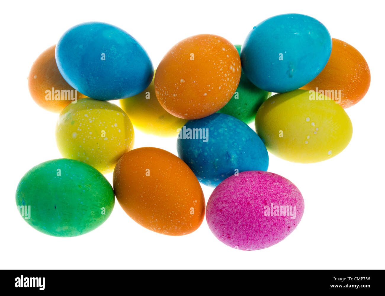 A mound of dyed Easter eggs isolated on white Stock Photo - Alamy