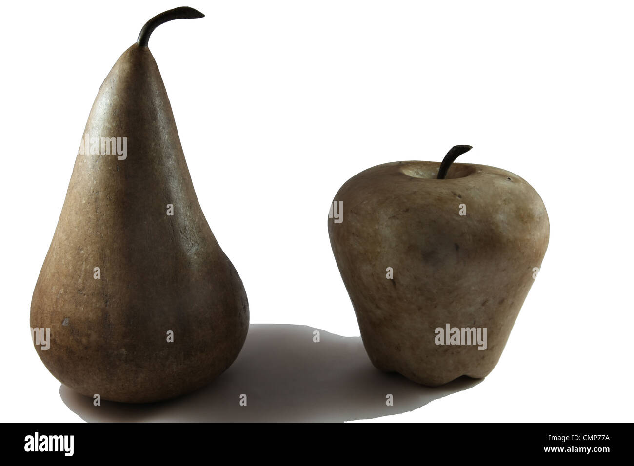 Apple & pear stone sculpture Stock Photo - Alamy