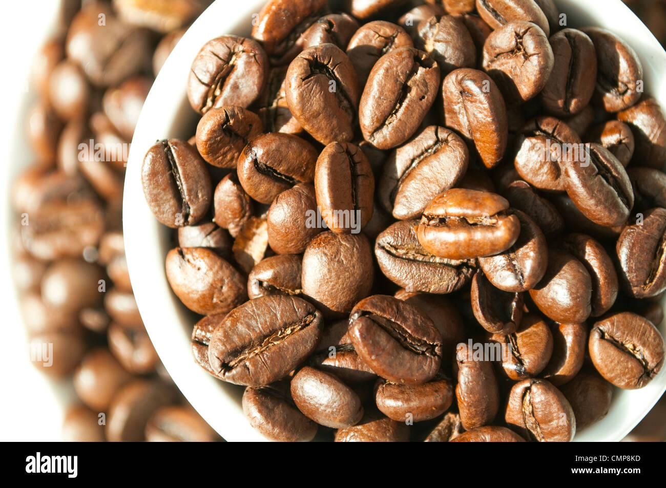 Coffee beans in cup Stock Photo - Alamy