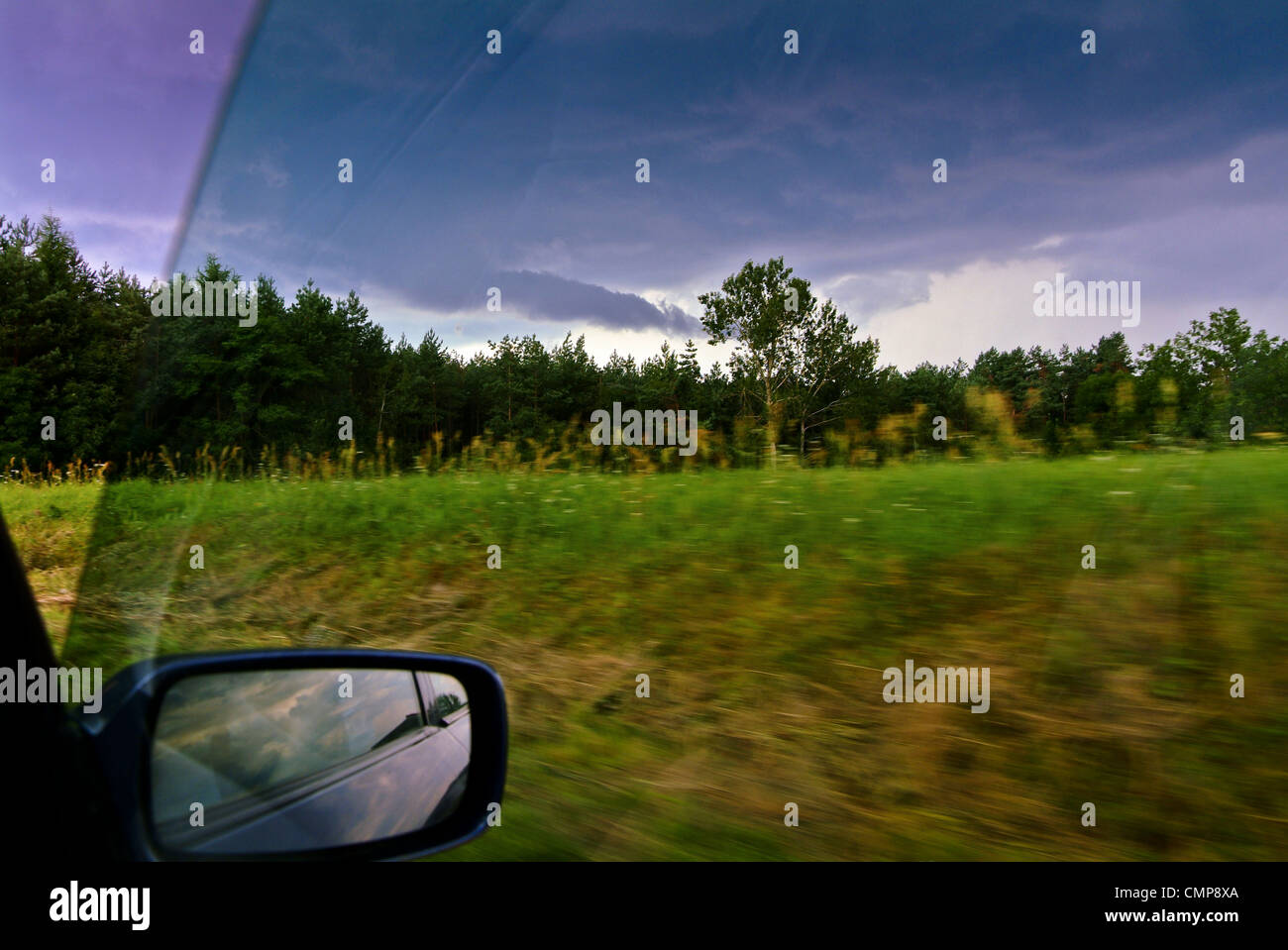 Landscape view of a passing car Stock Photo - Alamy