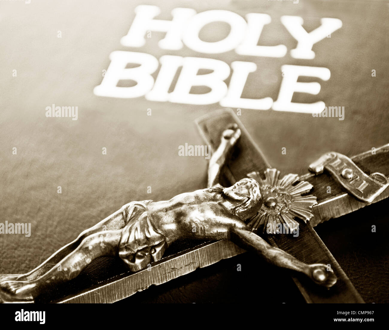 Cross on Bible Stock Photo - Alamy