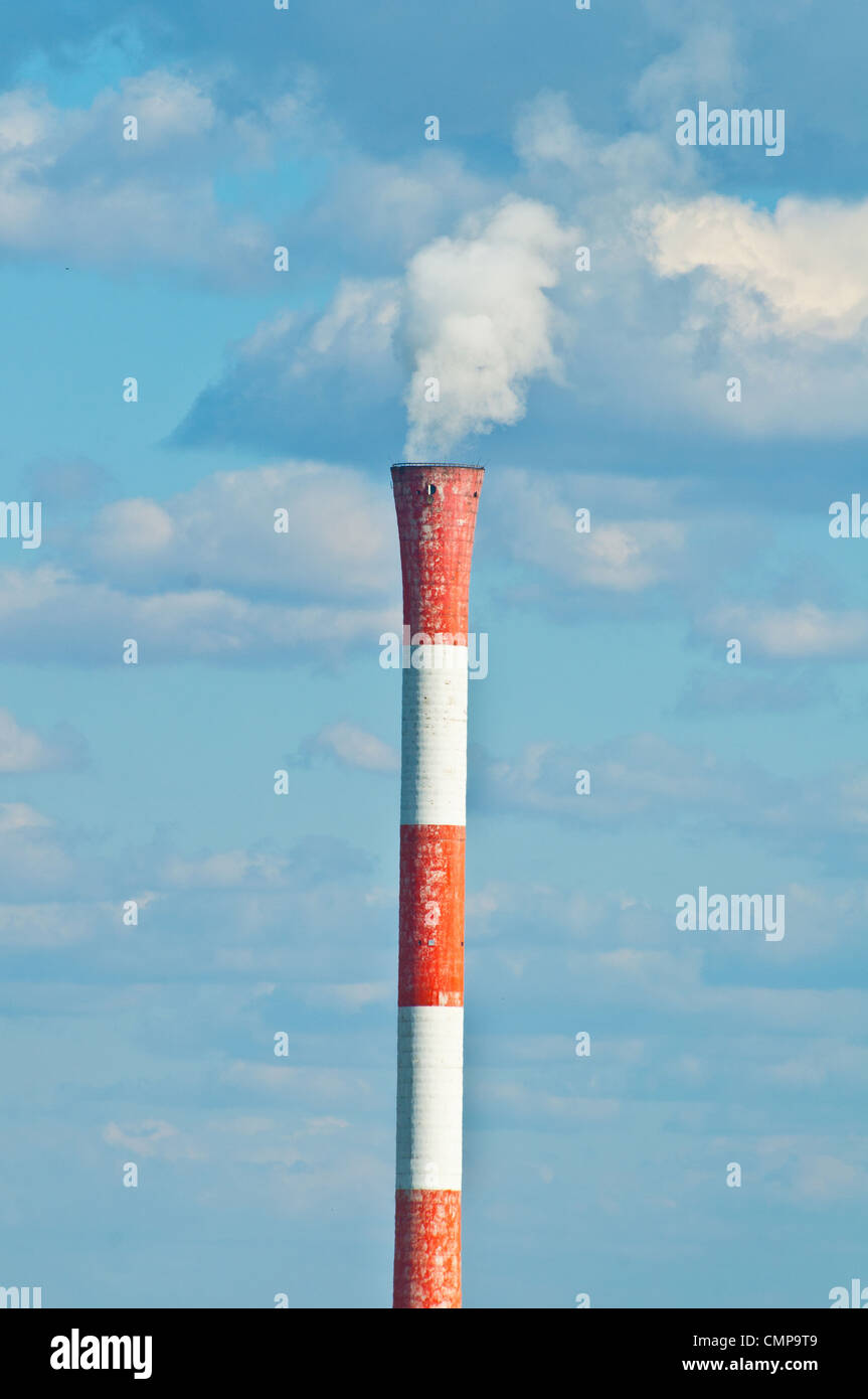 Factory pipe smoking with a white smoke over the blue sky Stock Photo ...