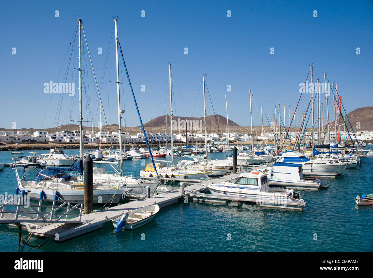 Marina and the town of Caleta del Sebo on the island of La Graciosa ...