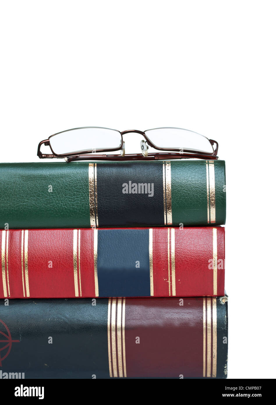 Glasses on books Stock Photo - Alamy