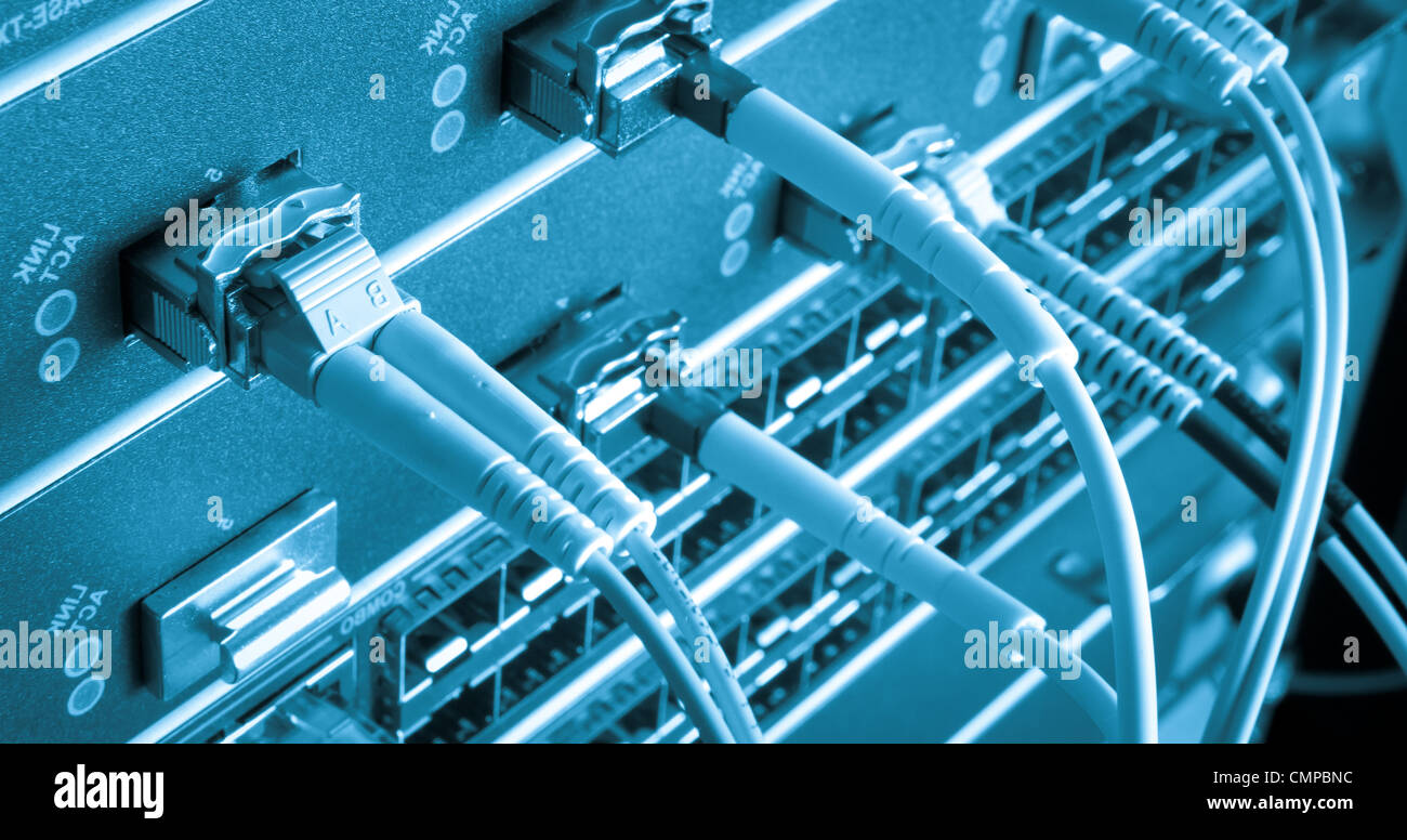 optic fiber cables connected to data center Stock Photo - Alamy