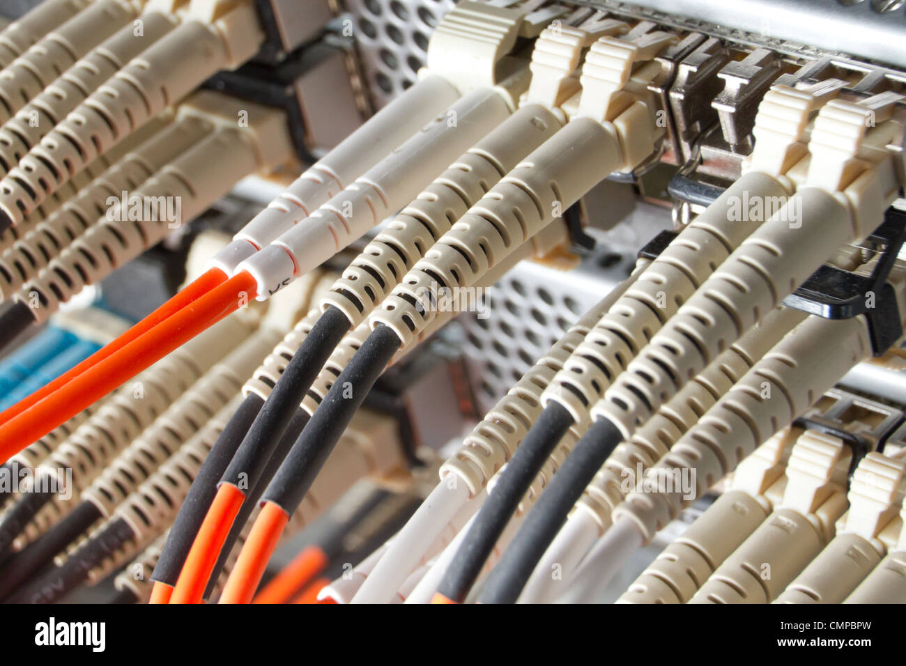 optic fiber cables connected to hub Stock Photo - Alamy