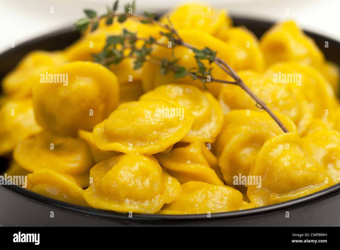 Yellow Dumplings on a plate closeup Stock Photo - Alamy