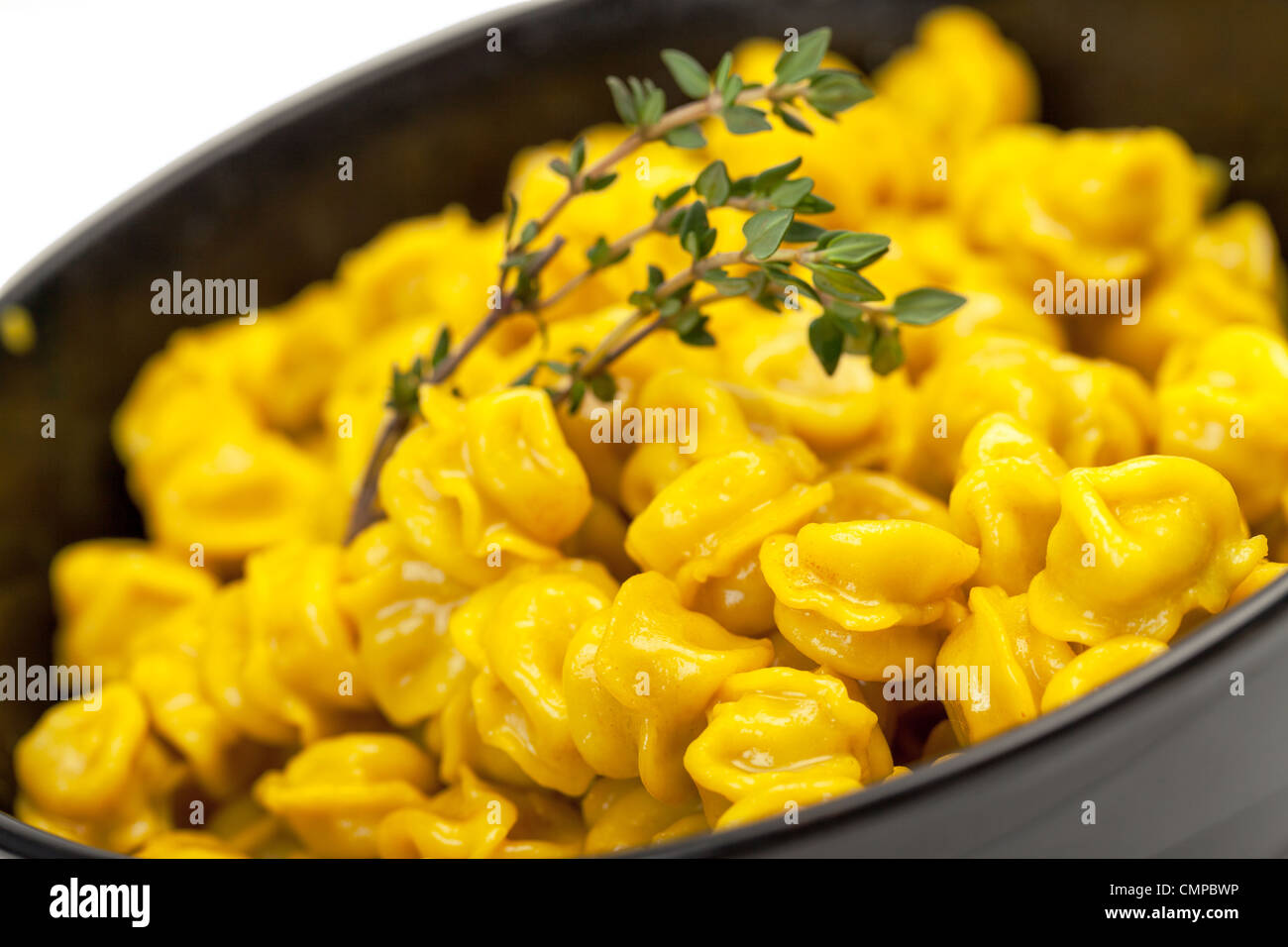 Yellow Dumplings on a plate closeup Stock Photo - Alamy