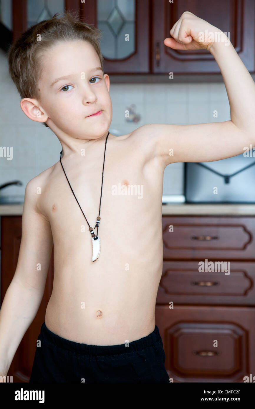 My little boy demonstrates the muscular strength Stock Photo - Alamy