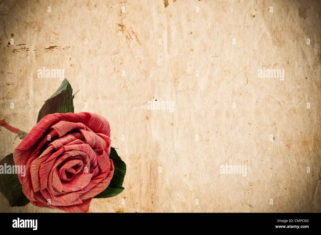 Vintage paper with red rose Stock Photo - Alamy