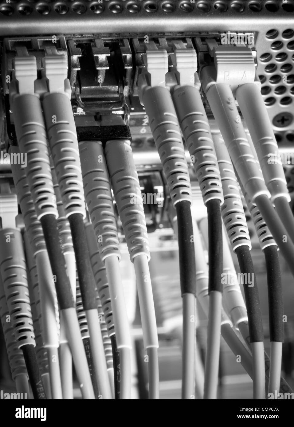 optic fiber cables connected to hub Stock Photo - Alamy