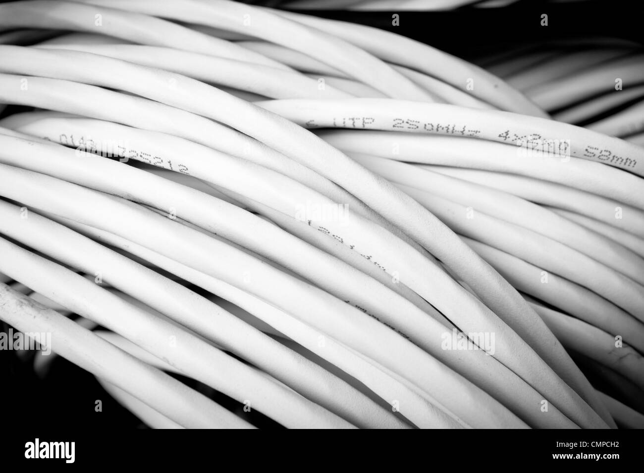 Group electric cables closeup Black and White Stock Photos & Images - Alamy