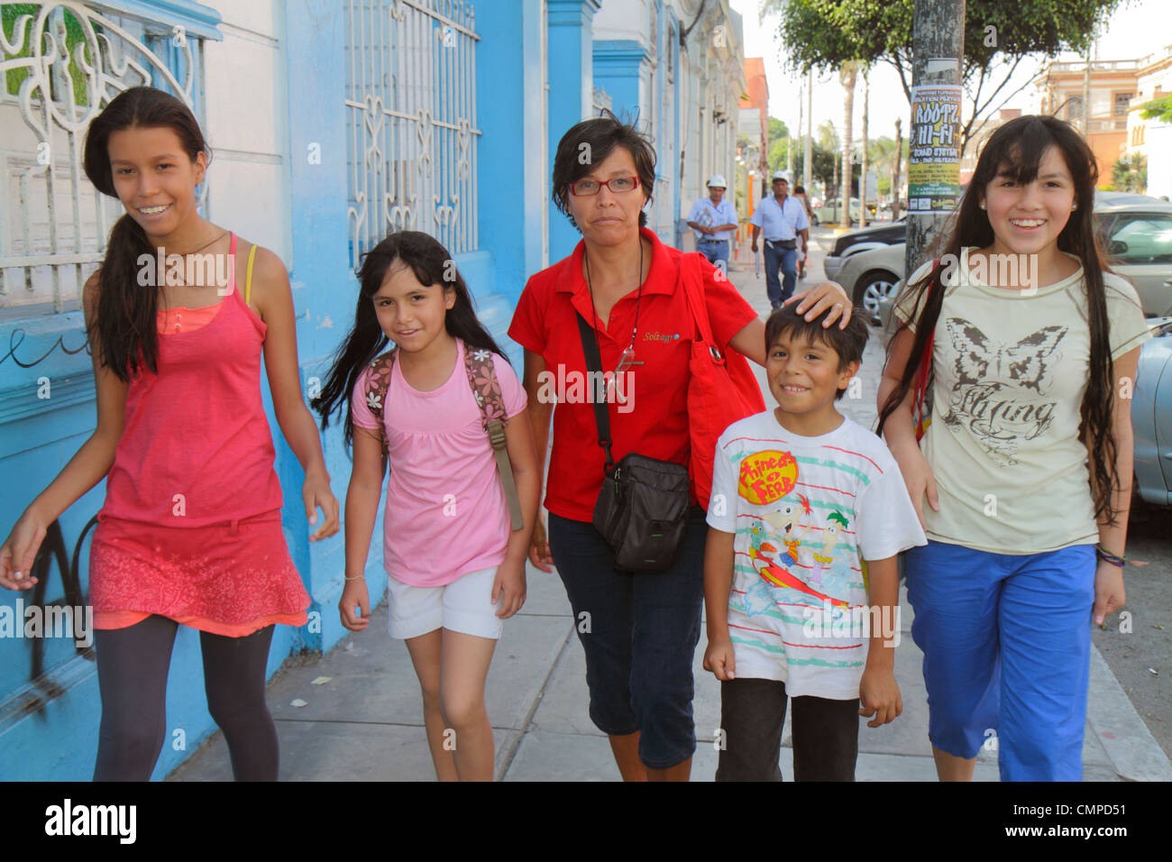 Older girl with younger children High Resolution Stock Photography and ...