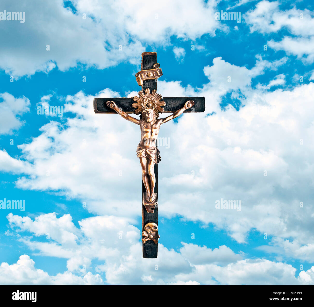 Jesus Christ over blue sky Stock Photo - Alamy