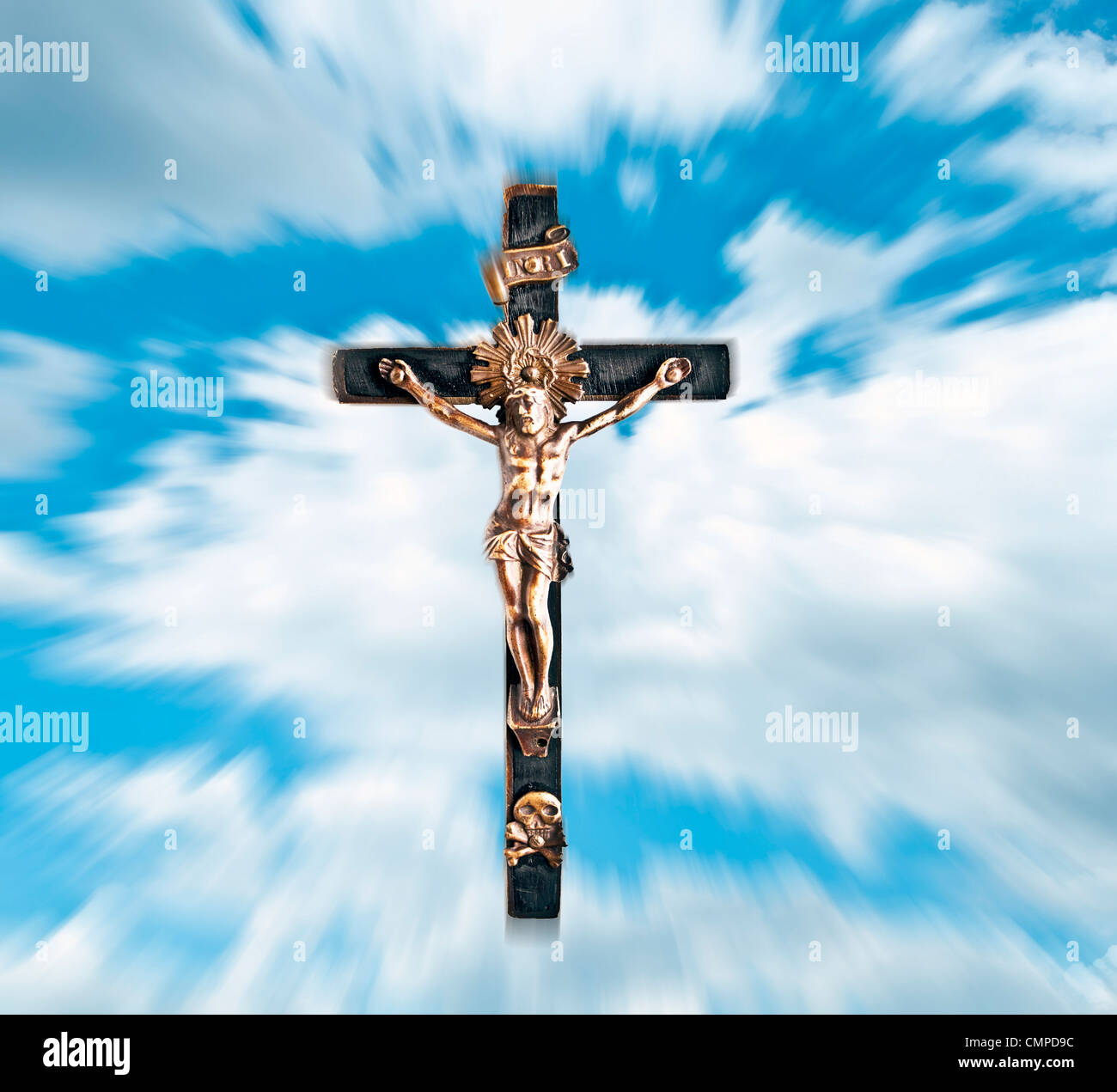 Jesus Christ against blue sky and clouds Stock Photo - Alamy