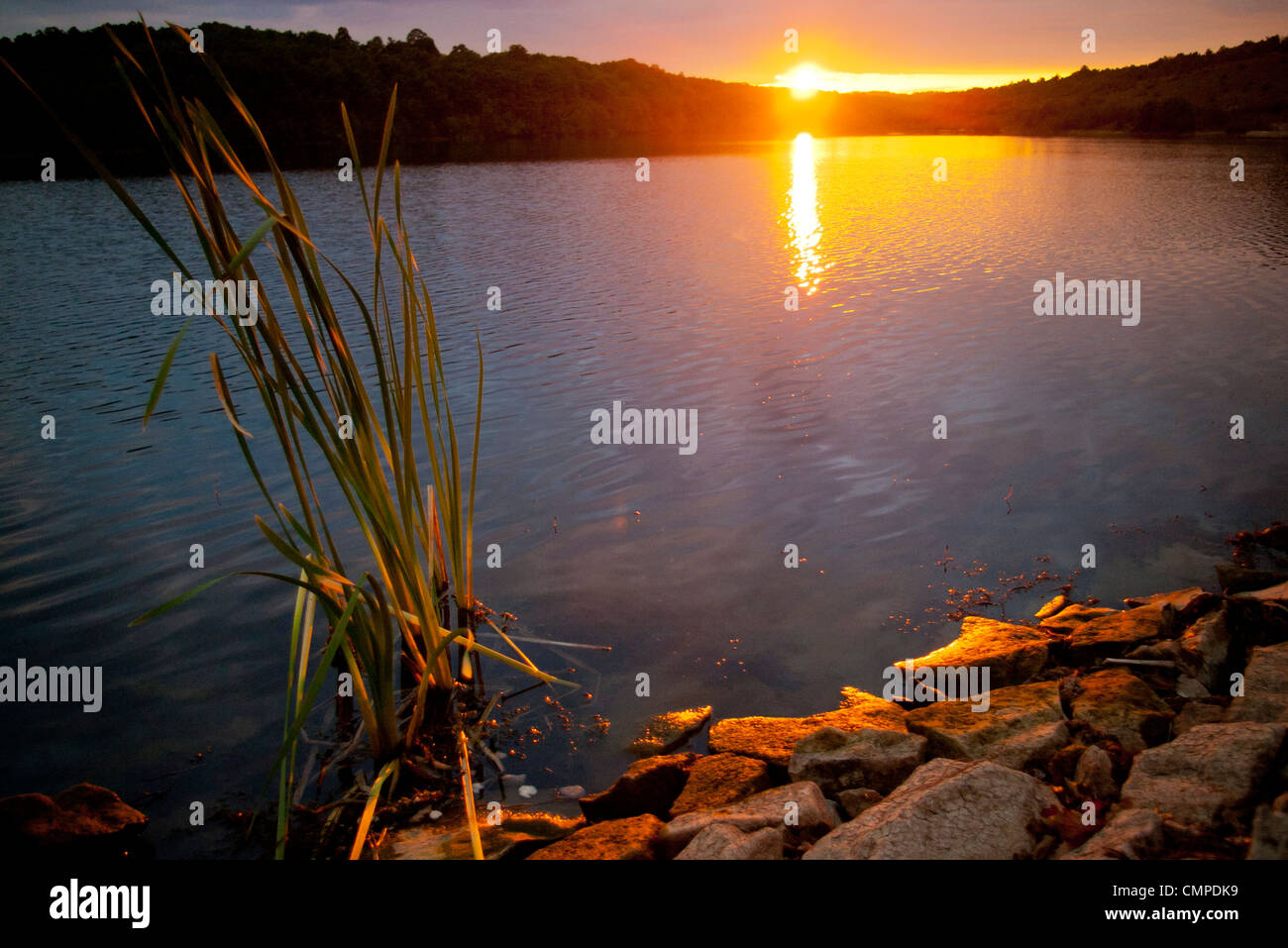 Sunset reflection over water hi-res stock photography and images - Alamy