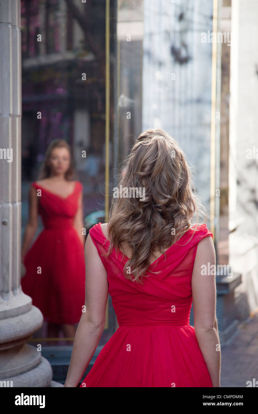 Photograph of a beautiful blond woman with a vintage or retro ...