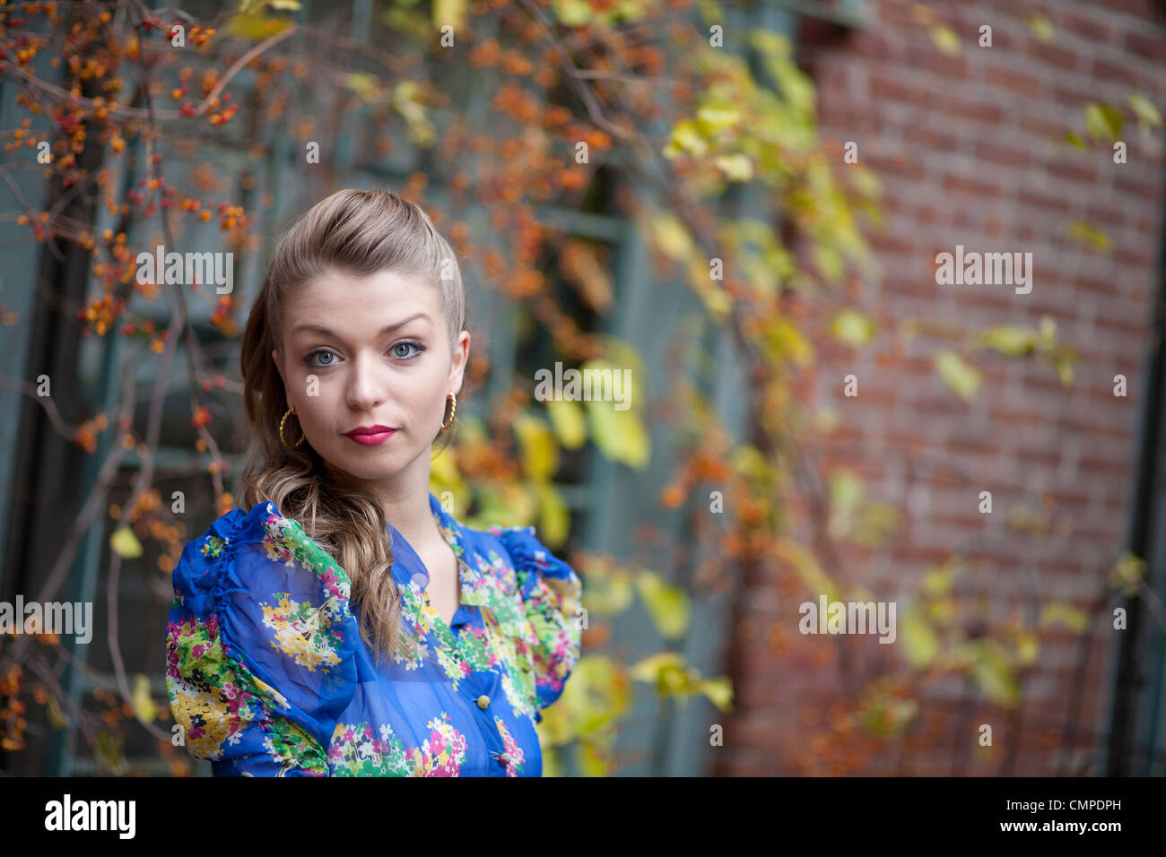 Photograph of a beautiful blond woman with a vintage or retro ...