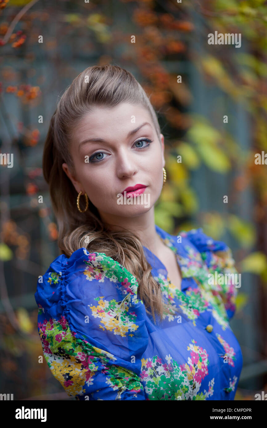 Photograph of a beautiful blond woman with a vintage or retro ...