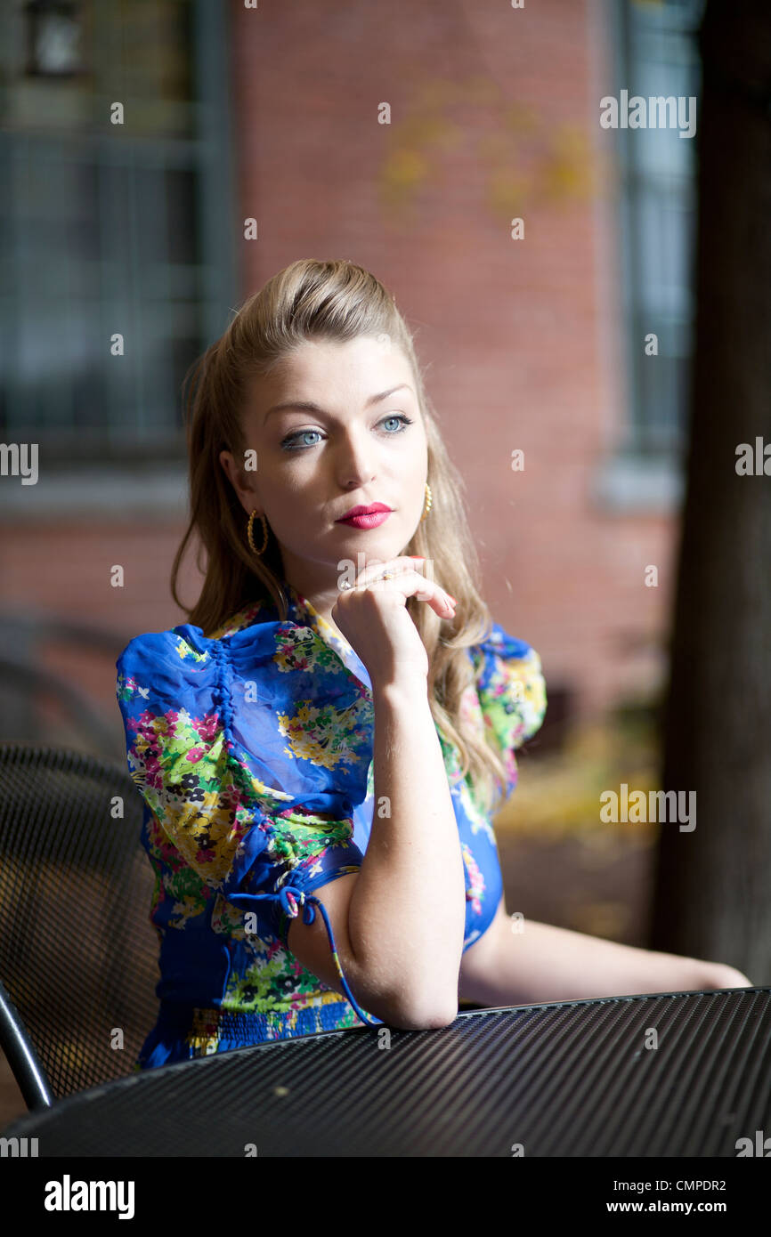 Photograph of a beautiful blond woman with a vintage or retro ...