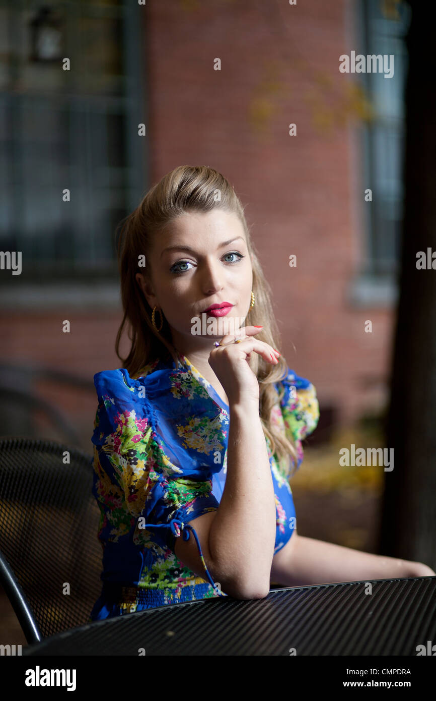 Photograph of a beautiful blond woman with a vintage or retro ...