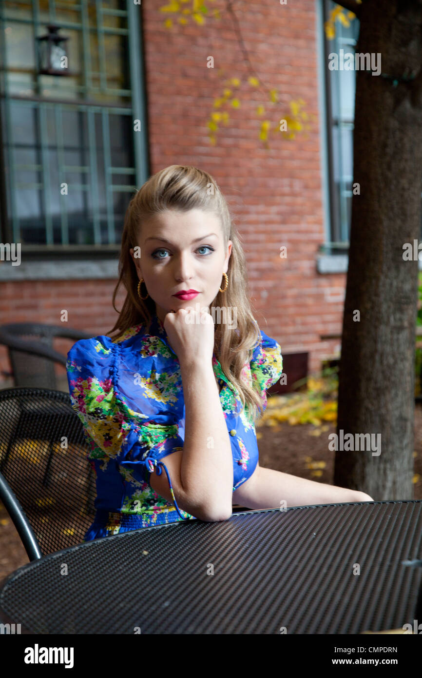 Photograph of a beautiful blond woman with a vintage or retro ...