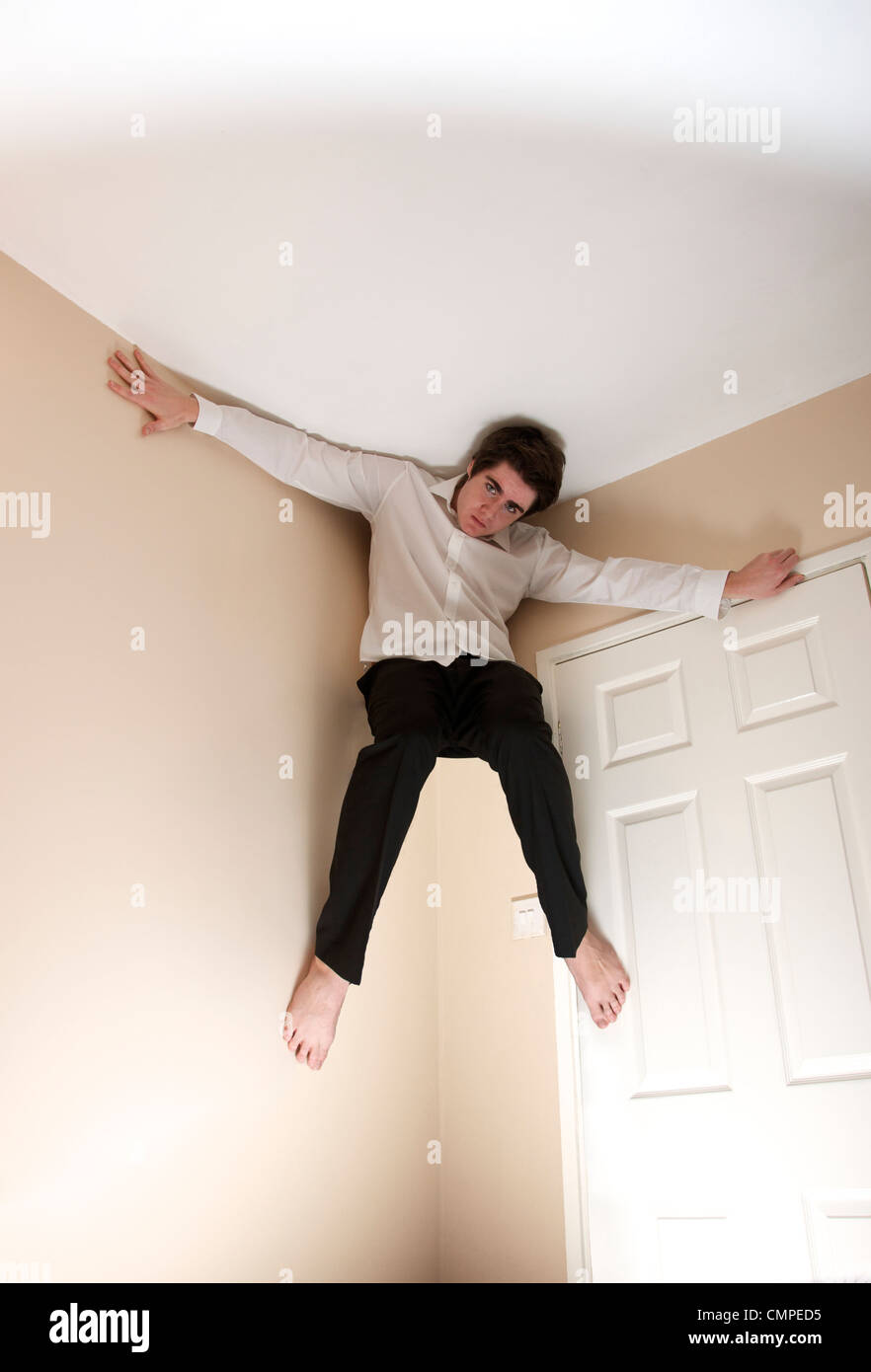 Floating up in the corner of a room Stock Photo - Alamy