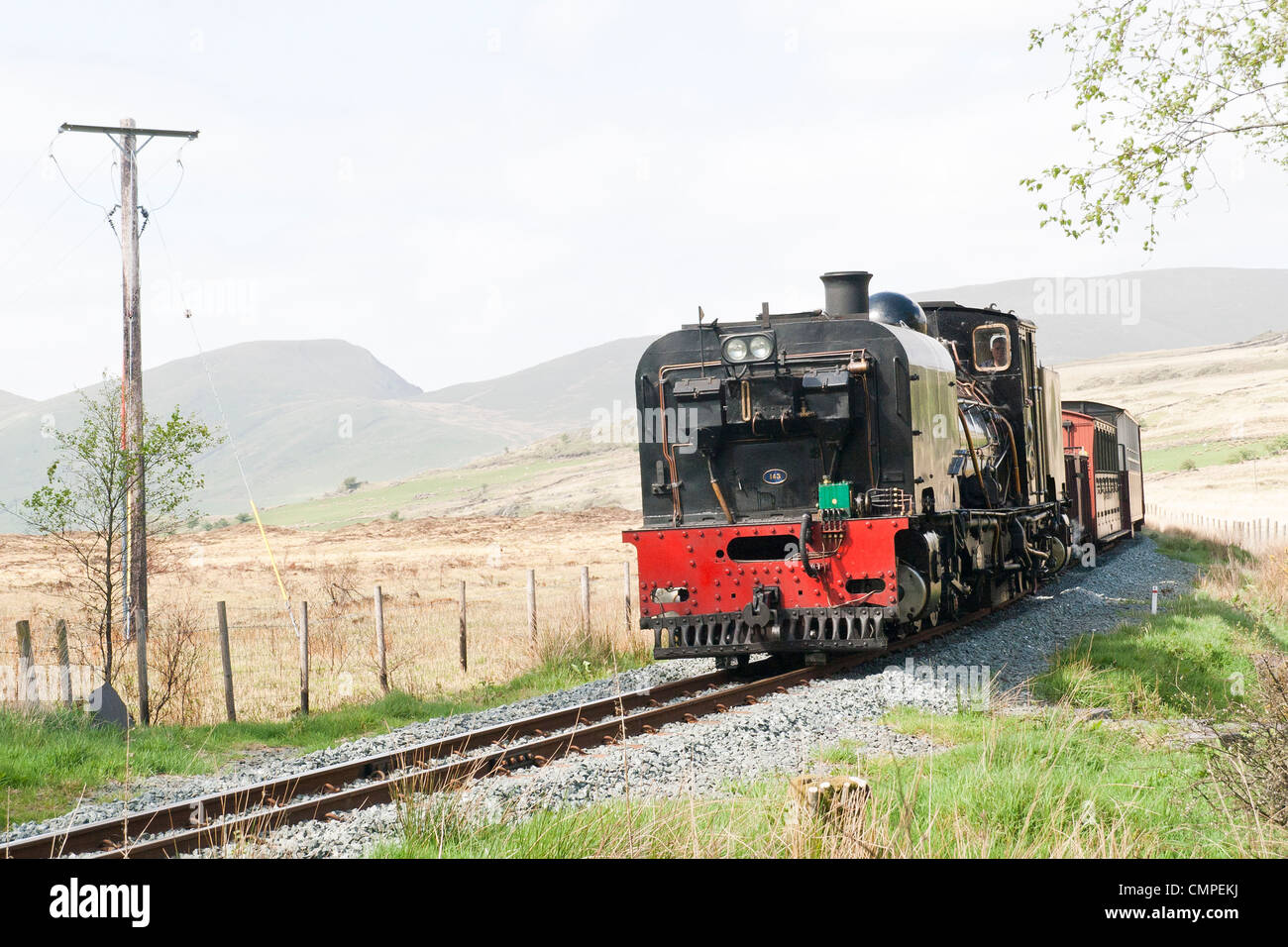 Steam locomotive pulling a passenger train on the Welsh Highland ...
