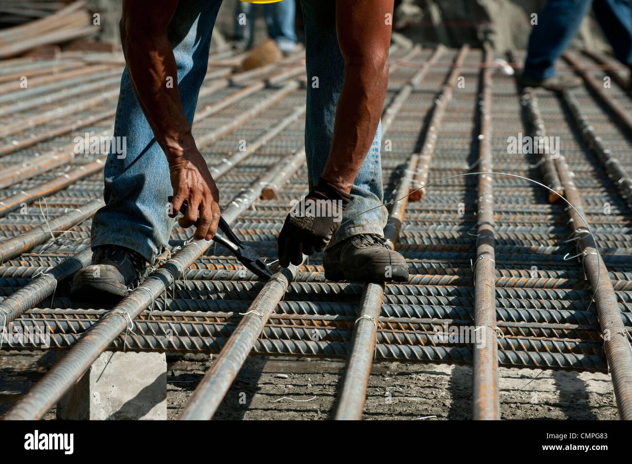 Man working on steel reinforcement Stock Photo - Alamy