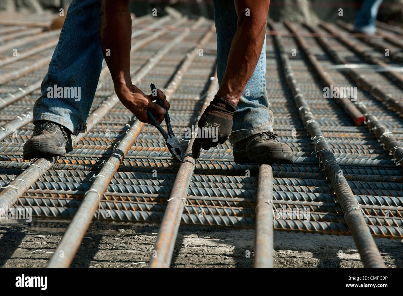 Man working on steel reinforcement Stock Photo - Alamy