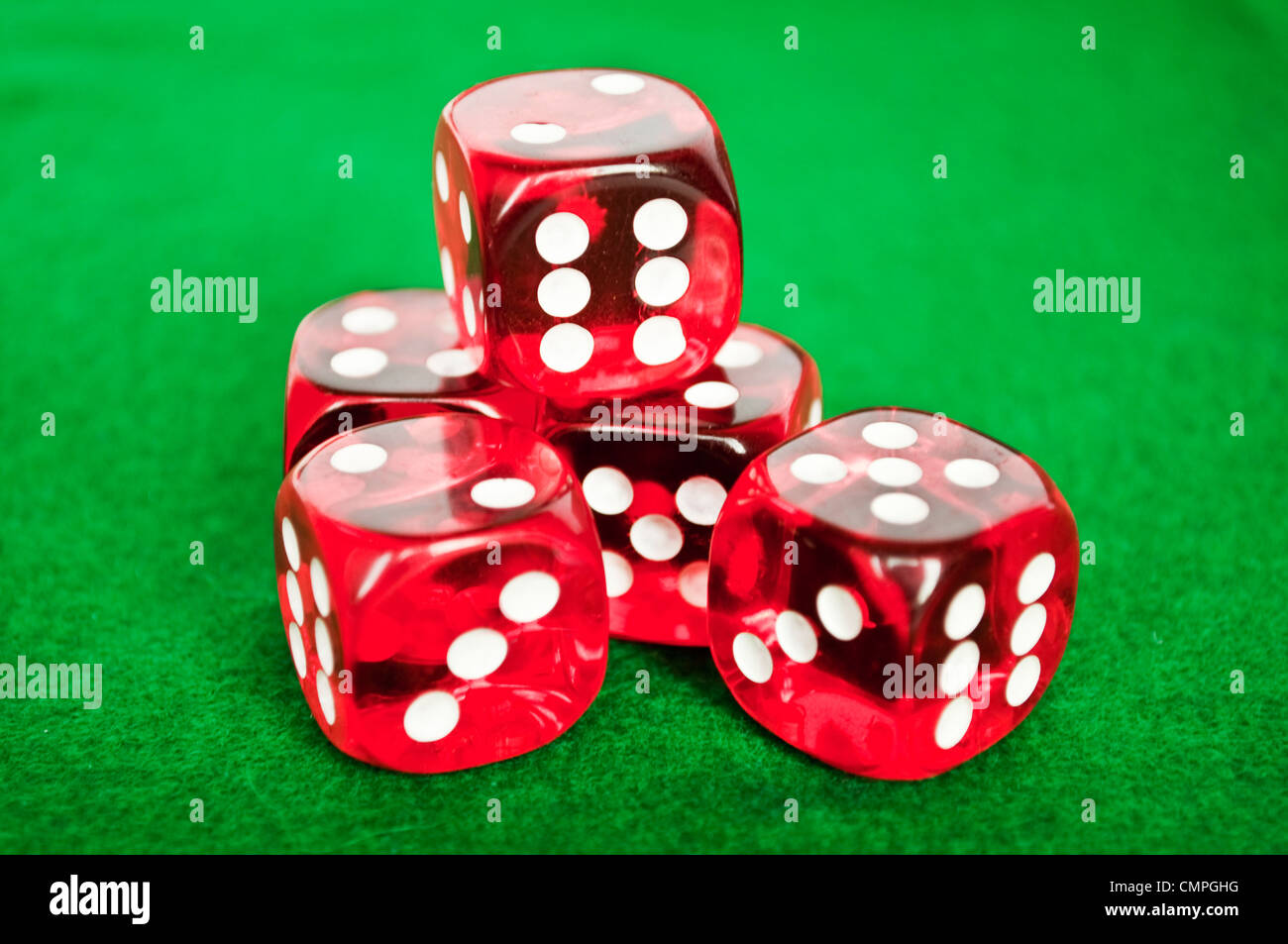 Set of gambling dices on green background Stock Photo - Alamy