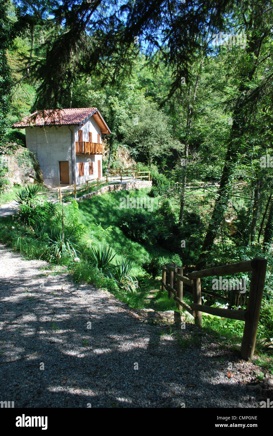 Small country house in the forest, Italy Stock Photo - Alamy