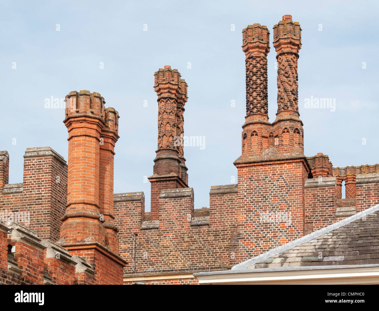 Medieval chimneys at Hampton Court Palace, Richmond on Thames, England ...