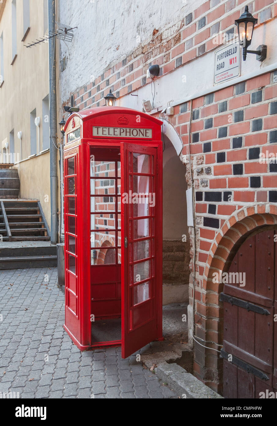British red telephone box used as an unusual entrance to a British pub ...