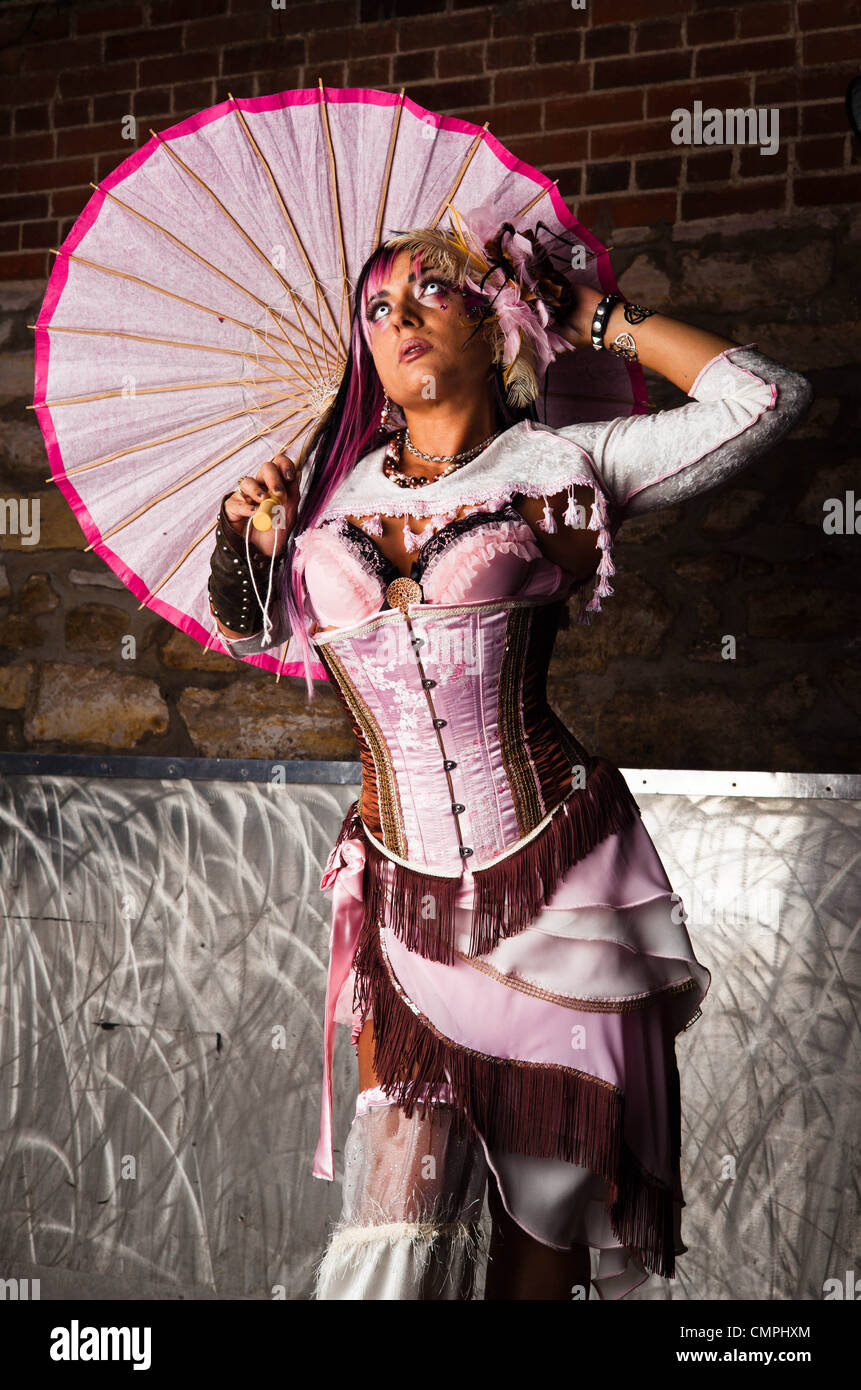 A pinup model dressed in Steam Punk fashion attire Stock Photo - Alamy