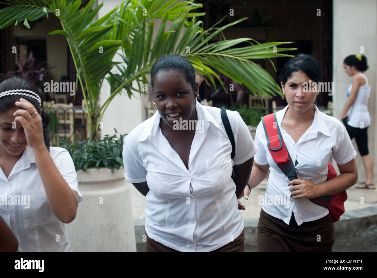 Young Cuban girls in school uniforms, smiling, Camaguey, Cuba Stock ...